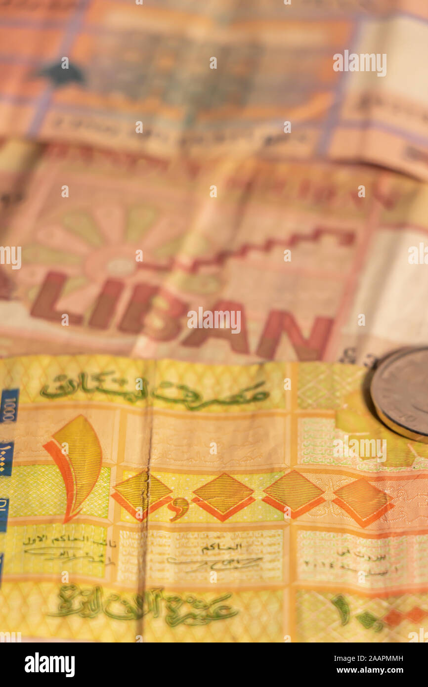 A composition of Lebanese lira LL. Lebanese pound LBP banknotes and ...