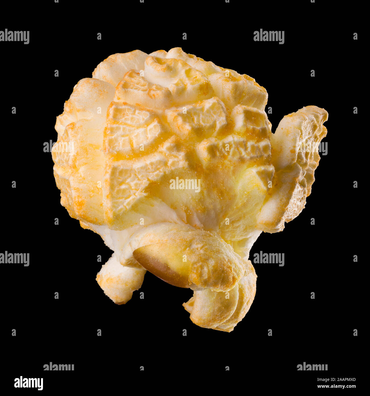Single popped popcorn on a black backgroundwith clipping path Stock ...
