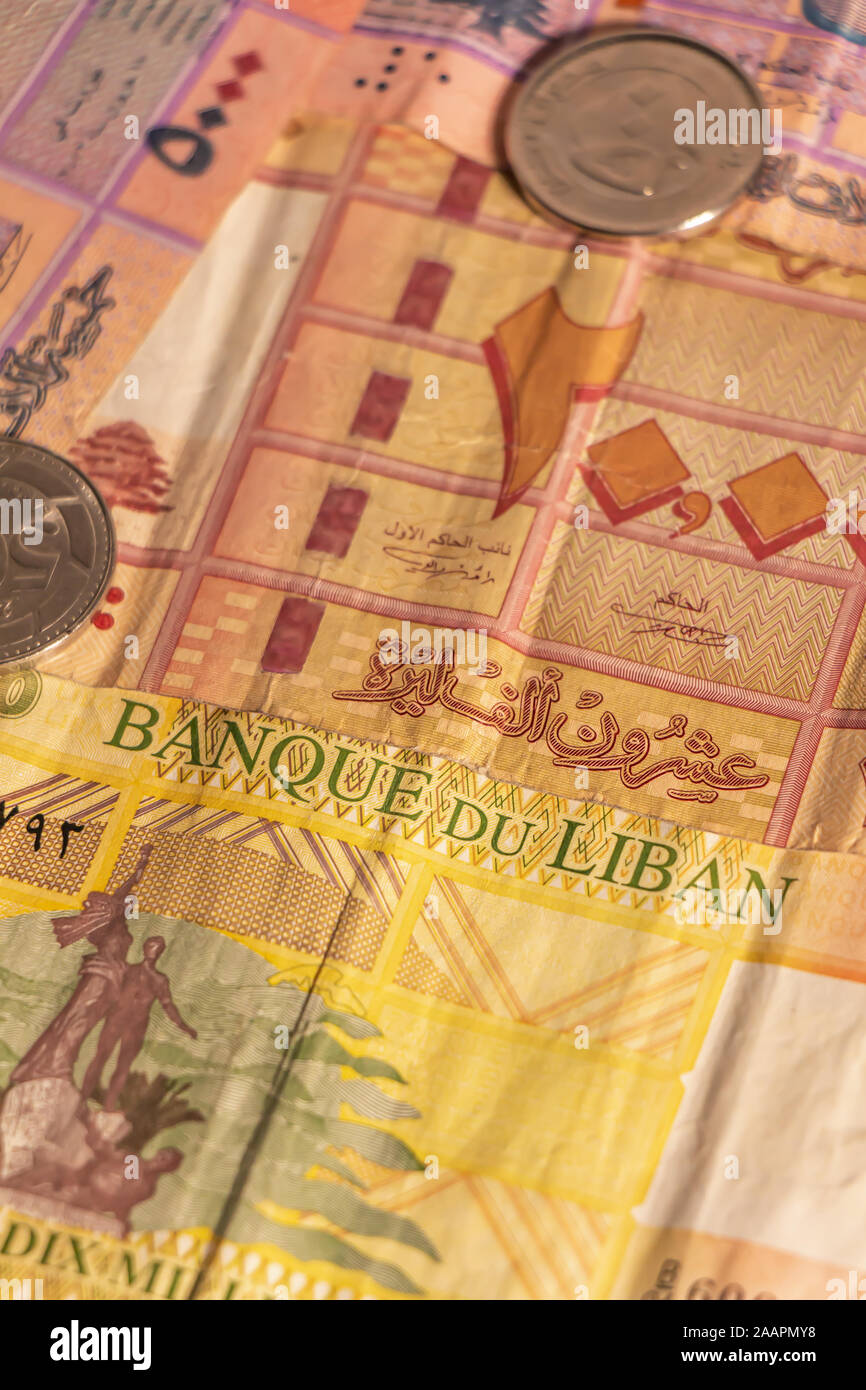 A composition of Lebanese lira LL. Lebanese pound LBP banknotes and ...