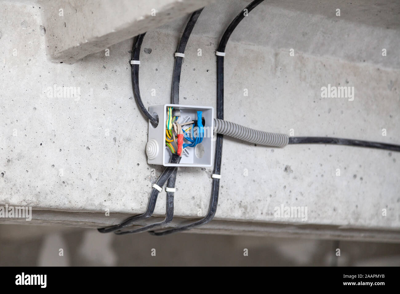 Cable laying ceiling. Electrical wires on wall. Wiring replacement ...