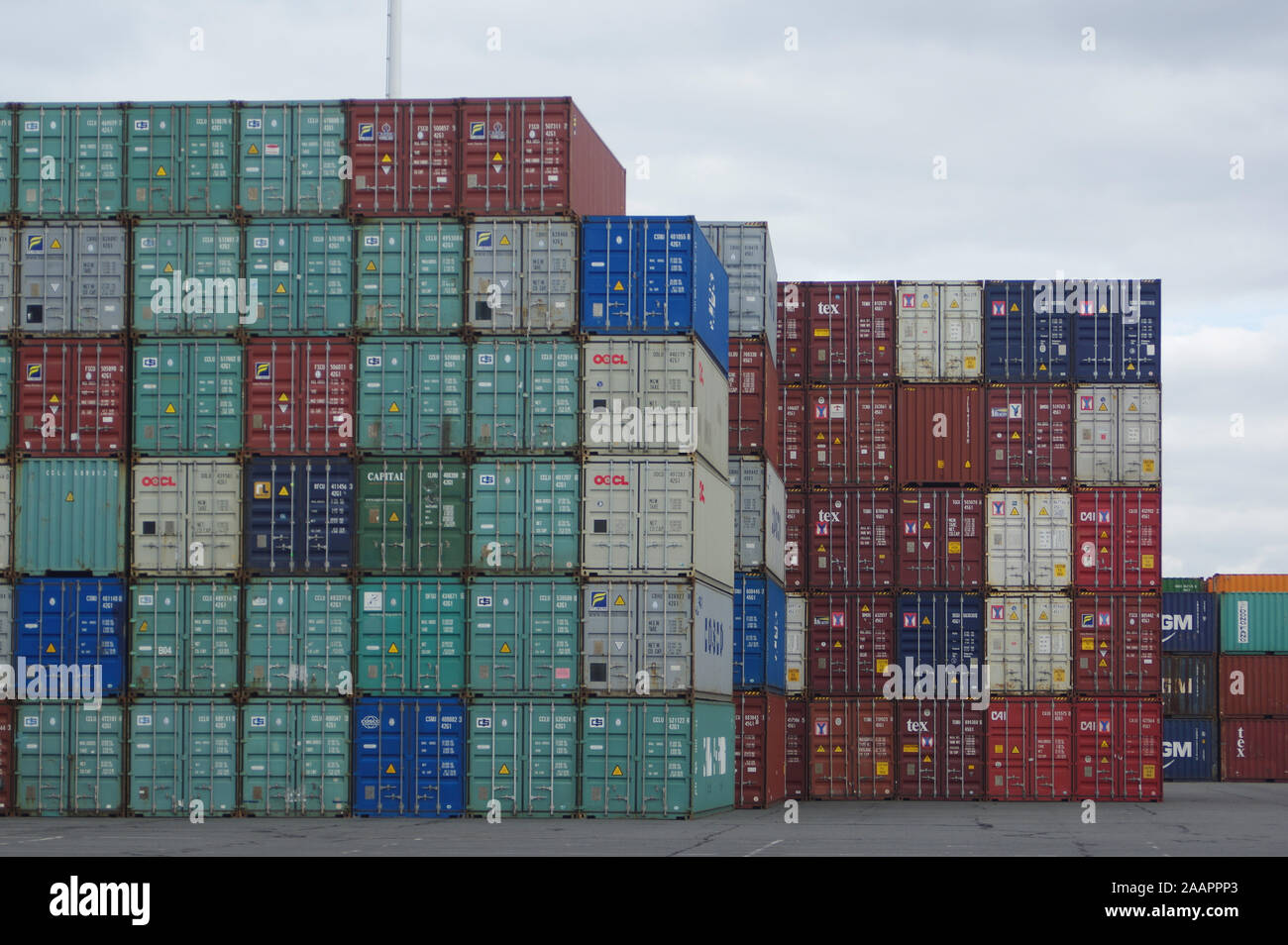 Freight shipping containers at the docks Stock Photo - Alamy