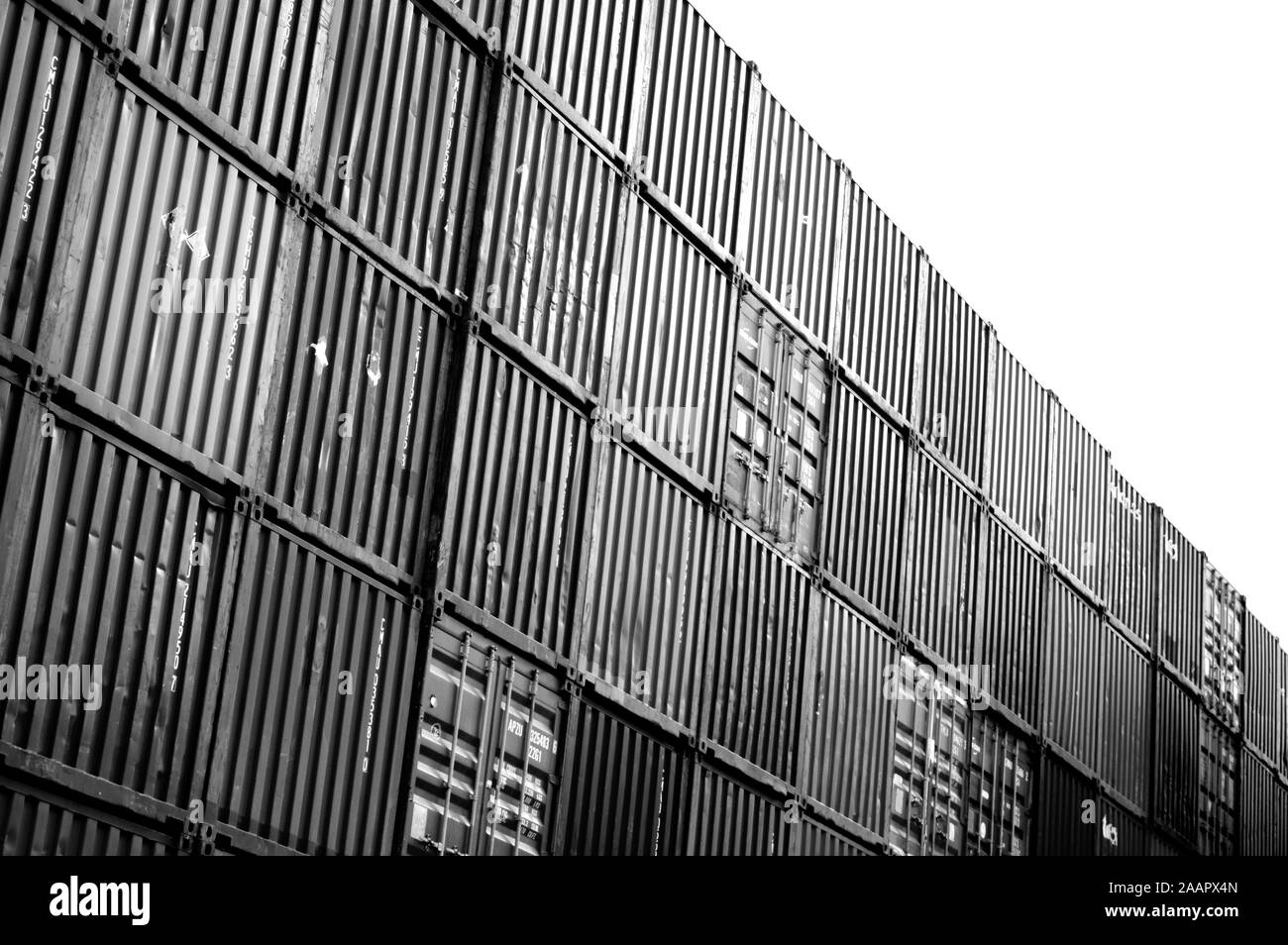 Freight shipping containers at the docks Stock Photo - Alamy