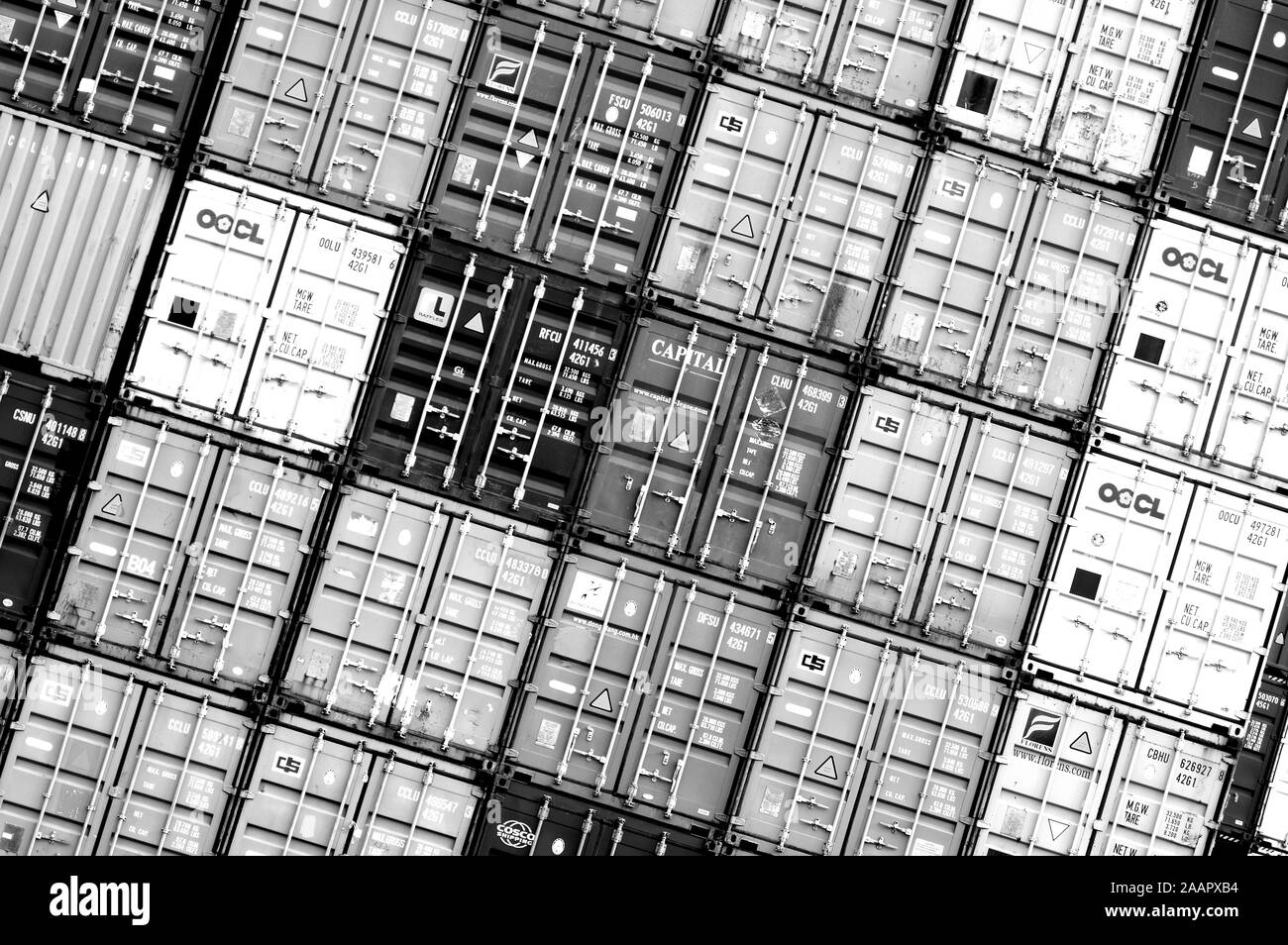 Freight shipping containers at the docks Stock Photo - Alamy