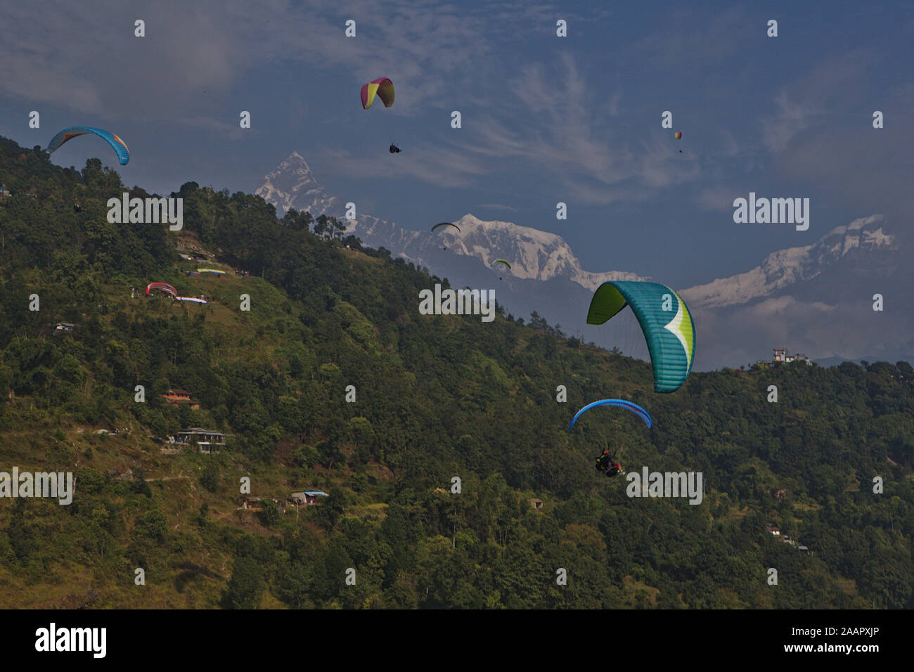 Paragliding over mountains hi-res stock photography and images - Alamy