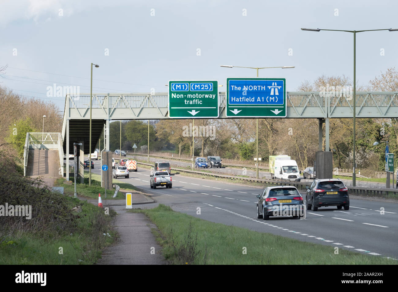 Roadsigns on the pedestrian bridge over the A1 near Shenley Stock Photo ...