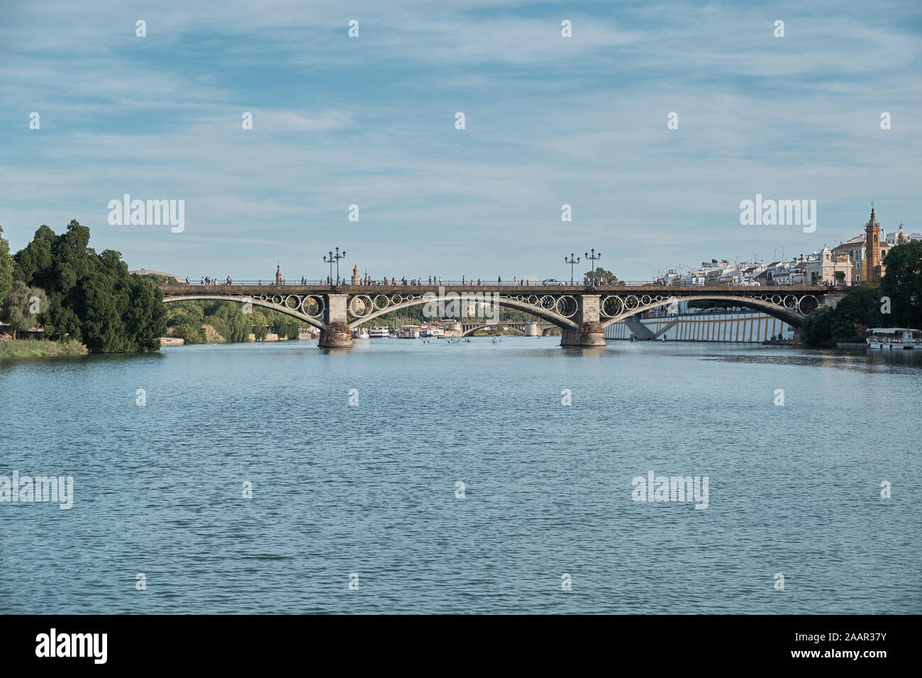 Tiana bridge - Isabel II bridge. Seville, Andalusia, Spain Stock Photo ...