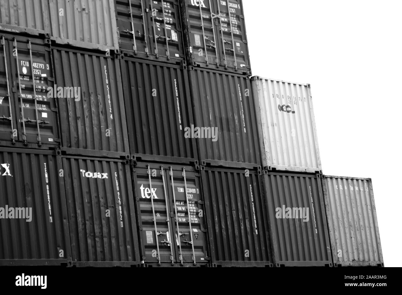 Freight shipping containers at the docks Stock Photo - Alamy