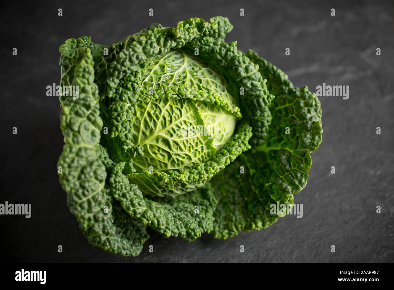 A whole British Savoy cabbage bought from a supermarket in the UK ...