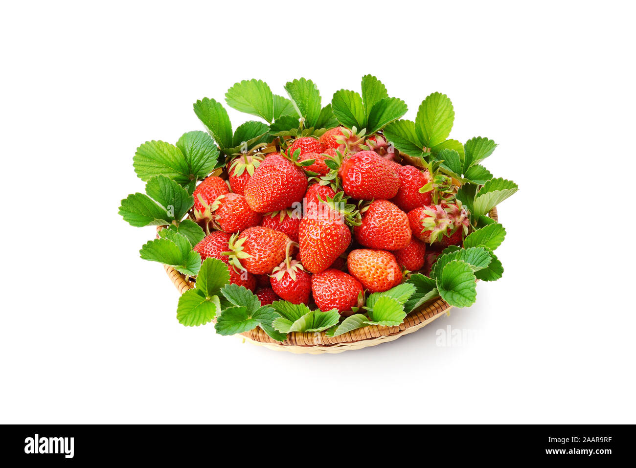 strawberries in a basket isolated on white background Stock Photo - Alamy
