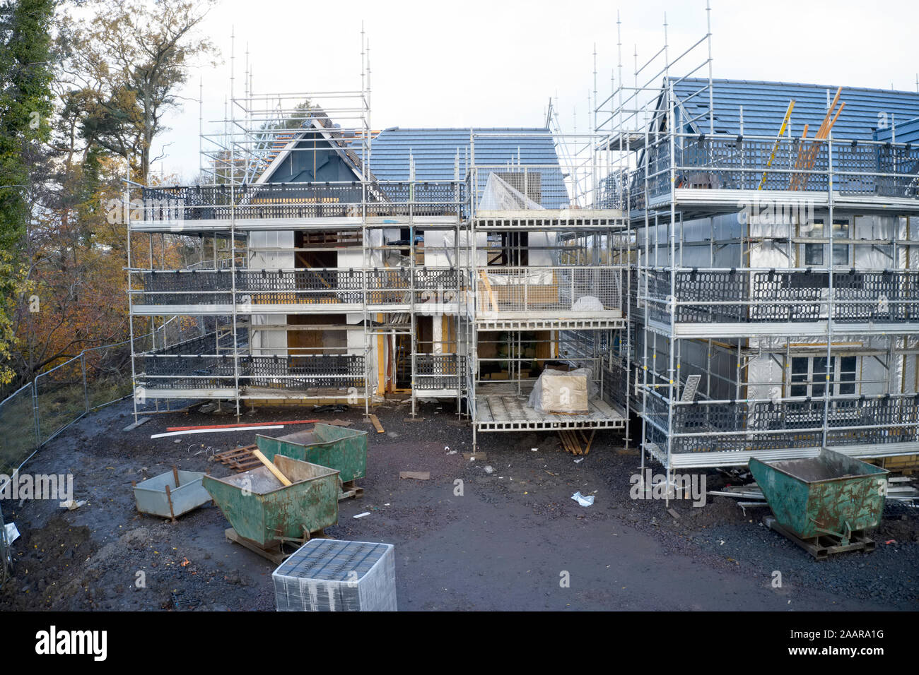 Scaffold at construction of new houses in residential building site UK ...