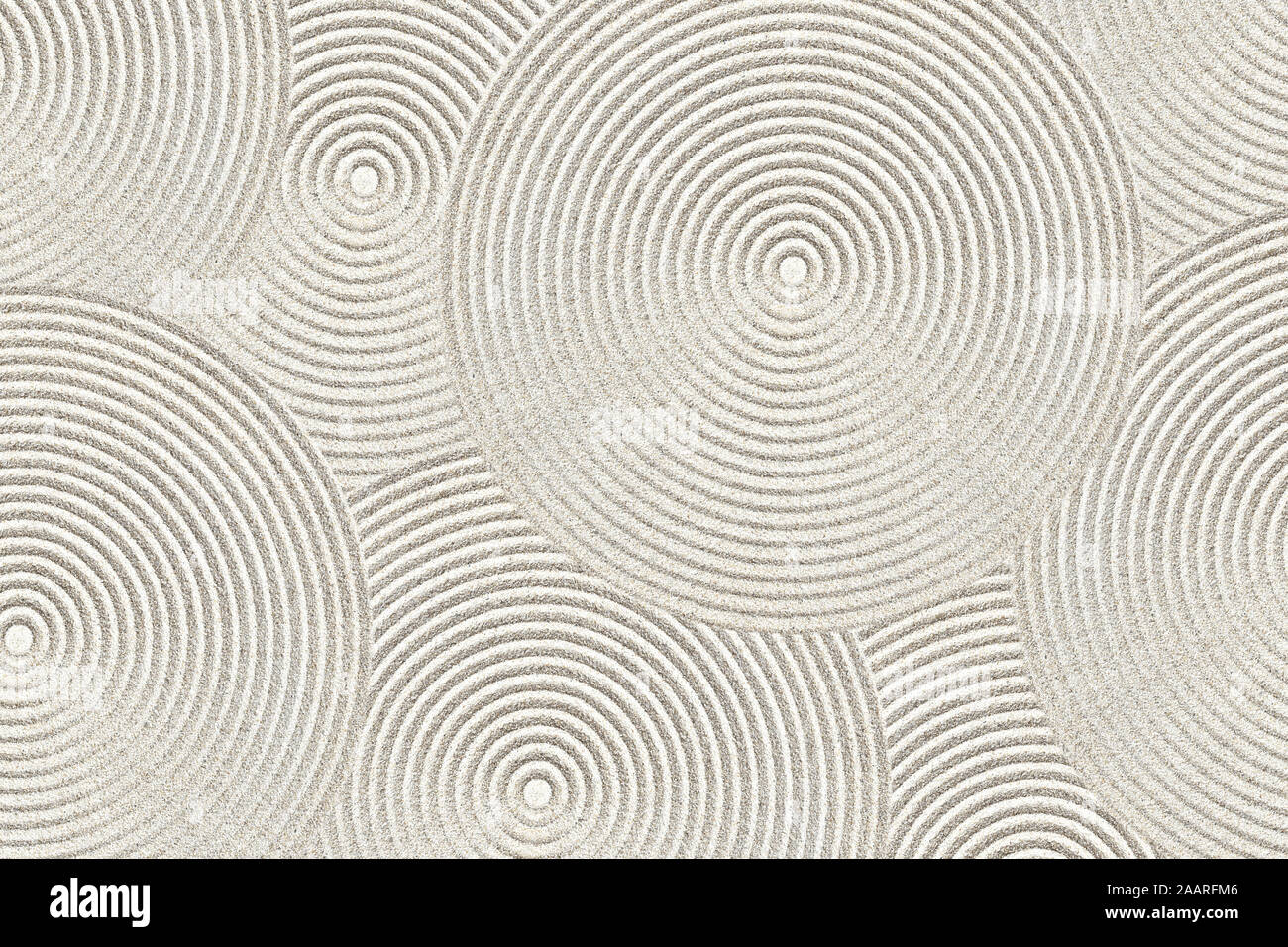 Zen circle pattern in sand Stock Photo - Alamy