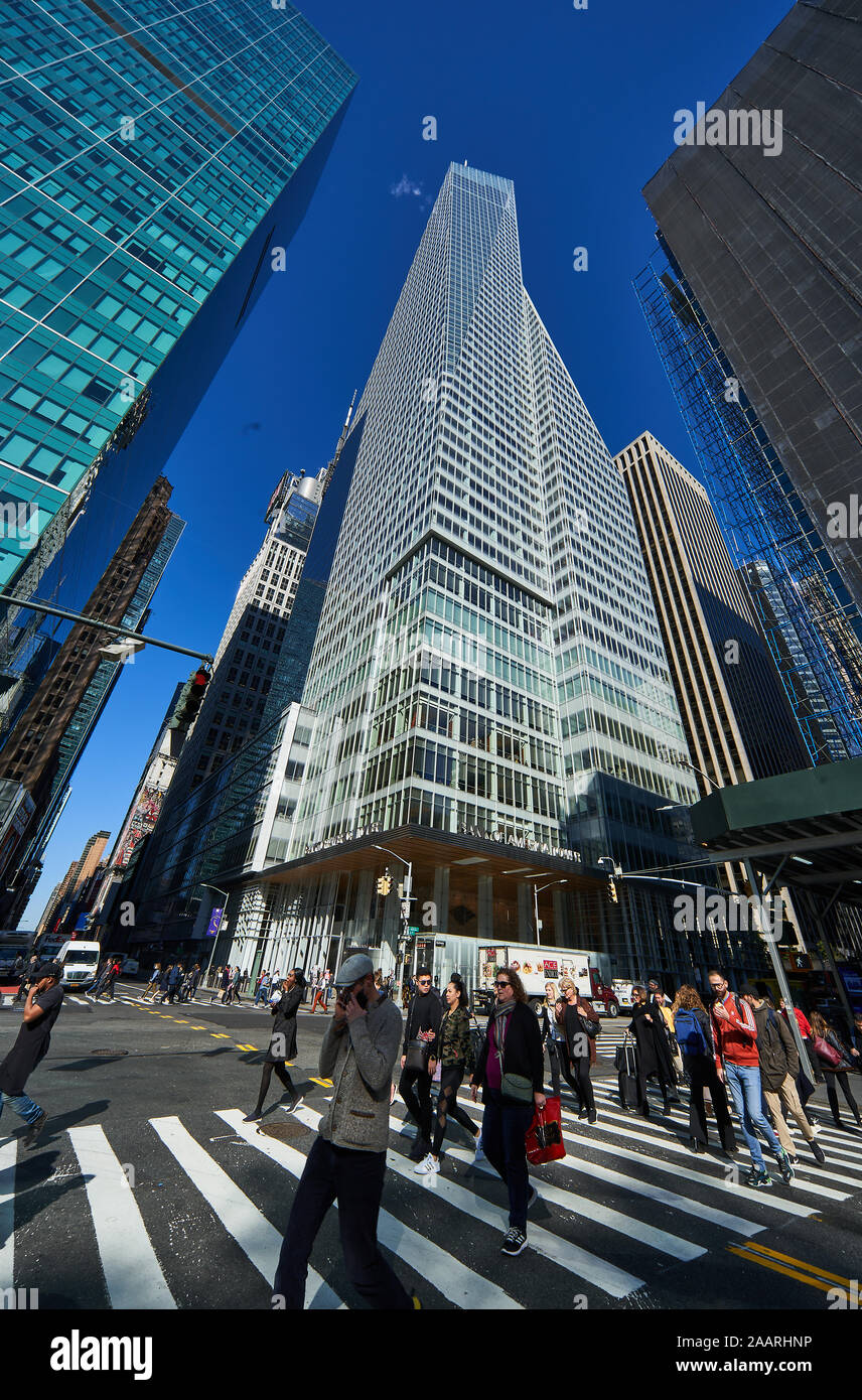 view of the massive midtown buildings in Manhattan from street level ...