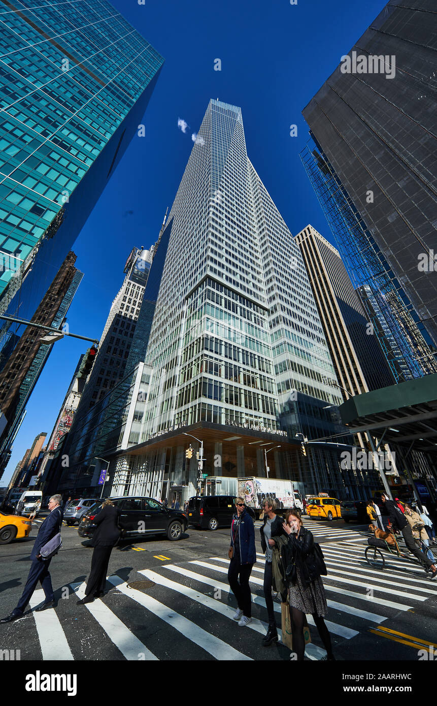 view of the massive midtown buildings in Manhattan from street level ...