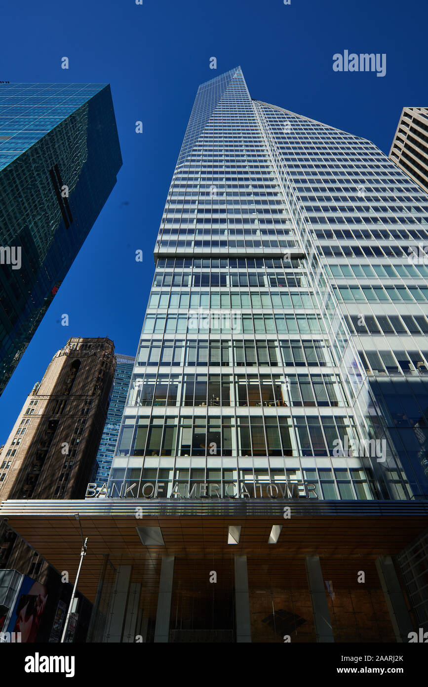 view of the massive midtown buildings in Manhattan from street level ...