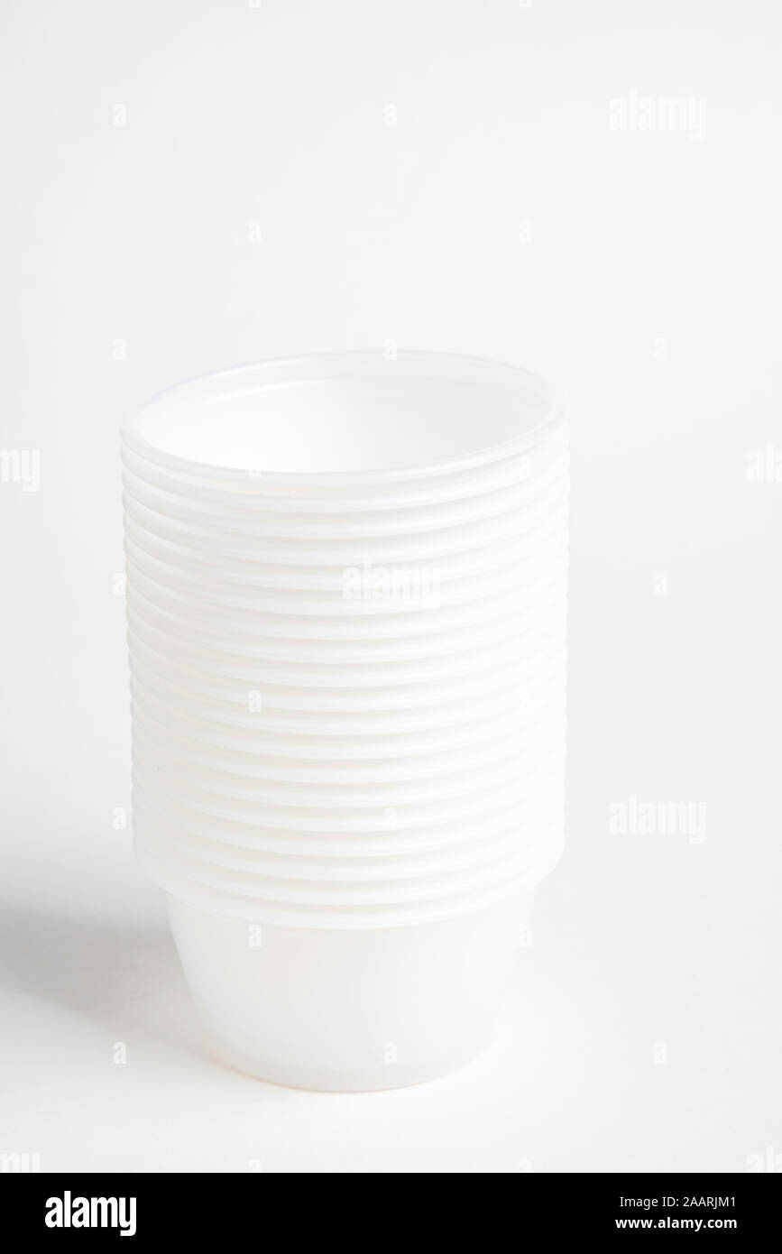 A stack of small plastic container for specimen medical laboratory ...