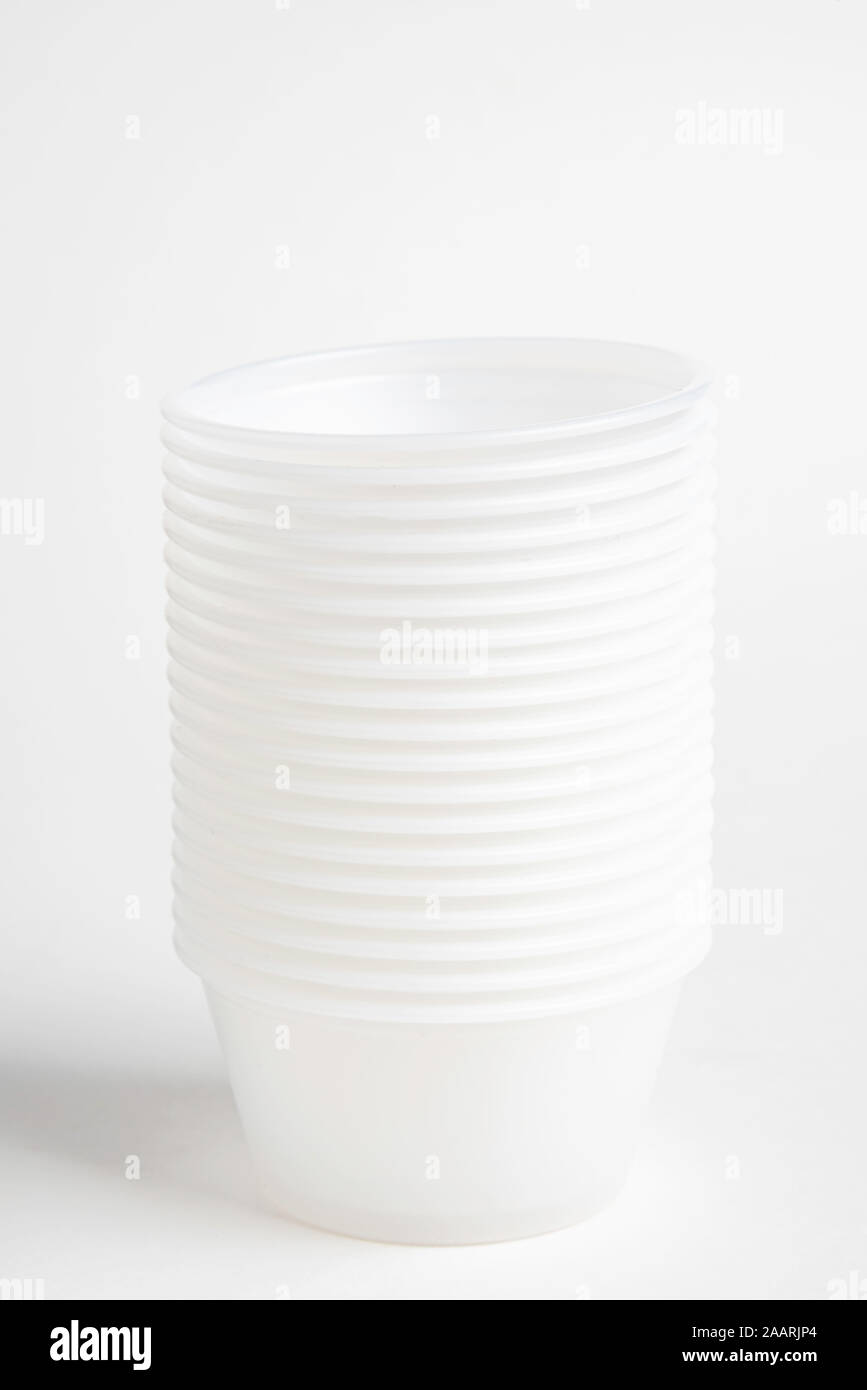 A stack of small plastic container for specimen medical laboratory ...