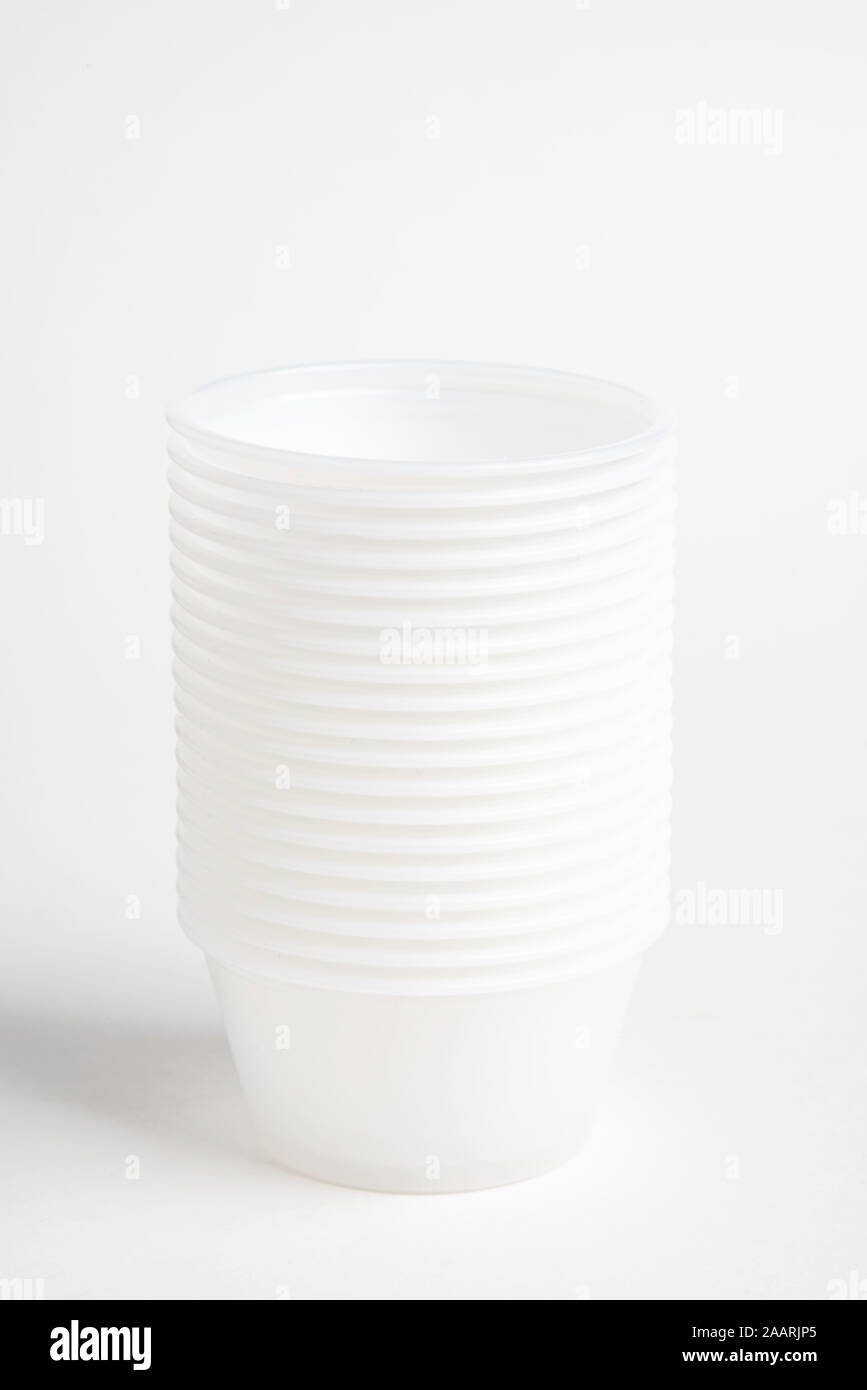 A stack of small plastic container for specimen medical laboratory ...