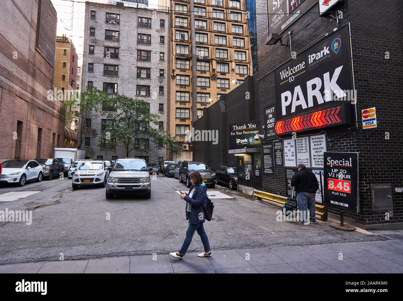 view of the massive midtown buildings in Manhattan from street level ...