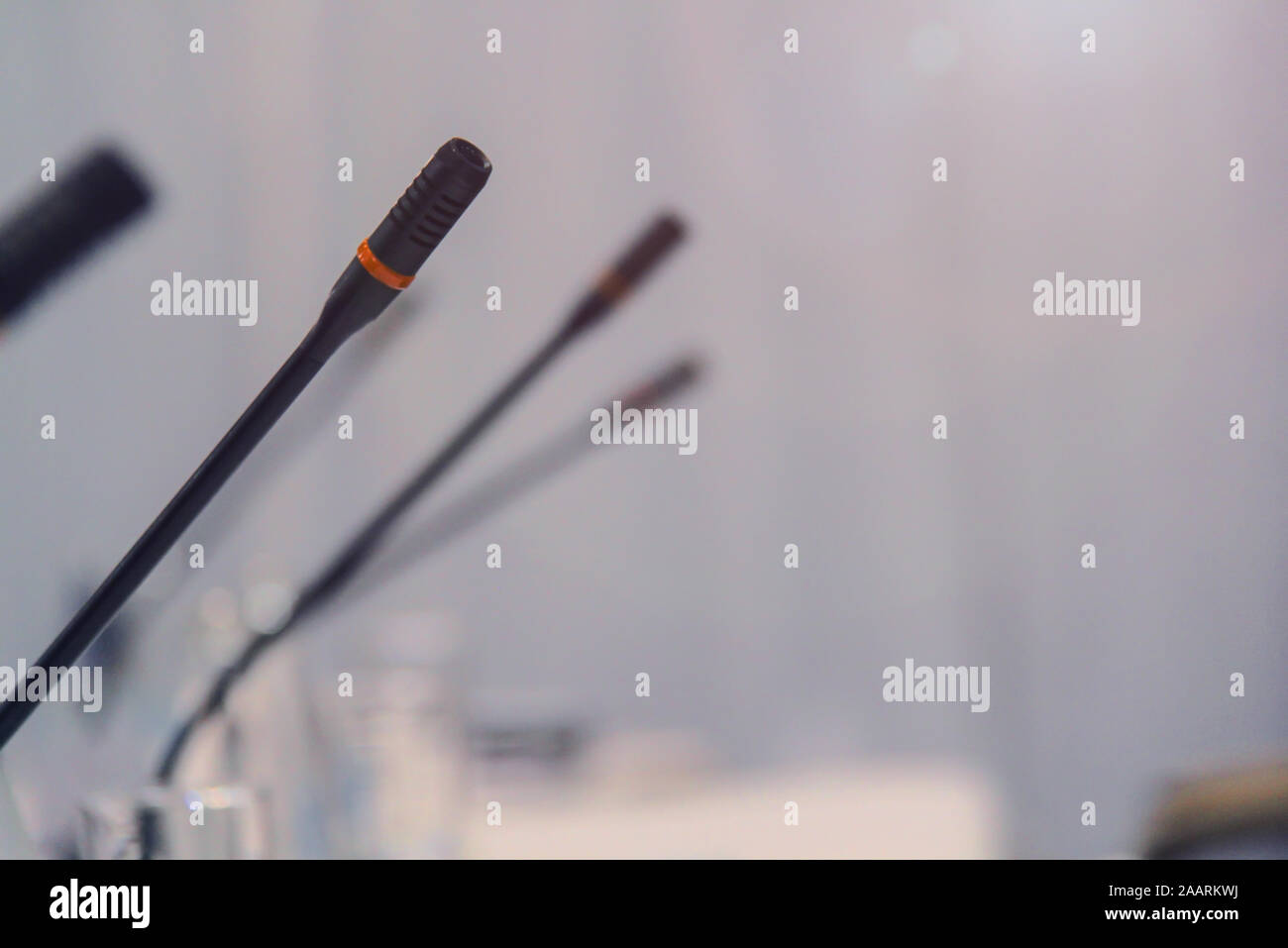 Front view of the microphones during business conference in conference ...
