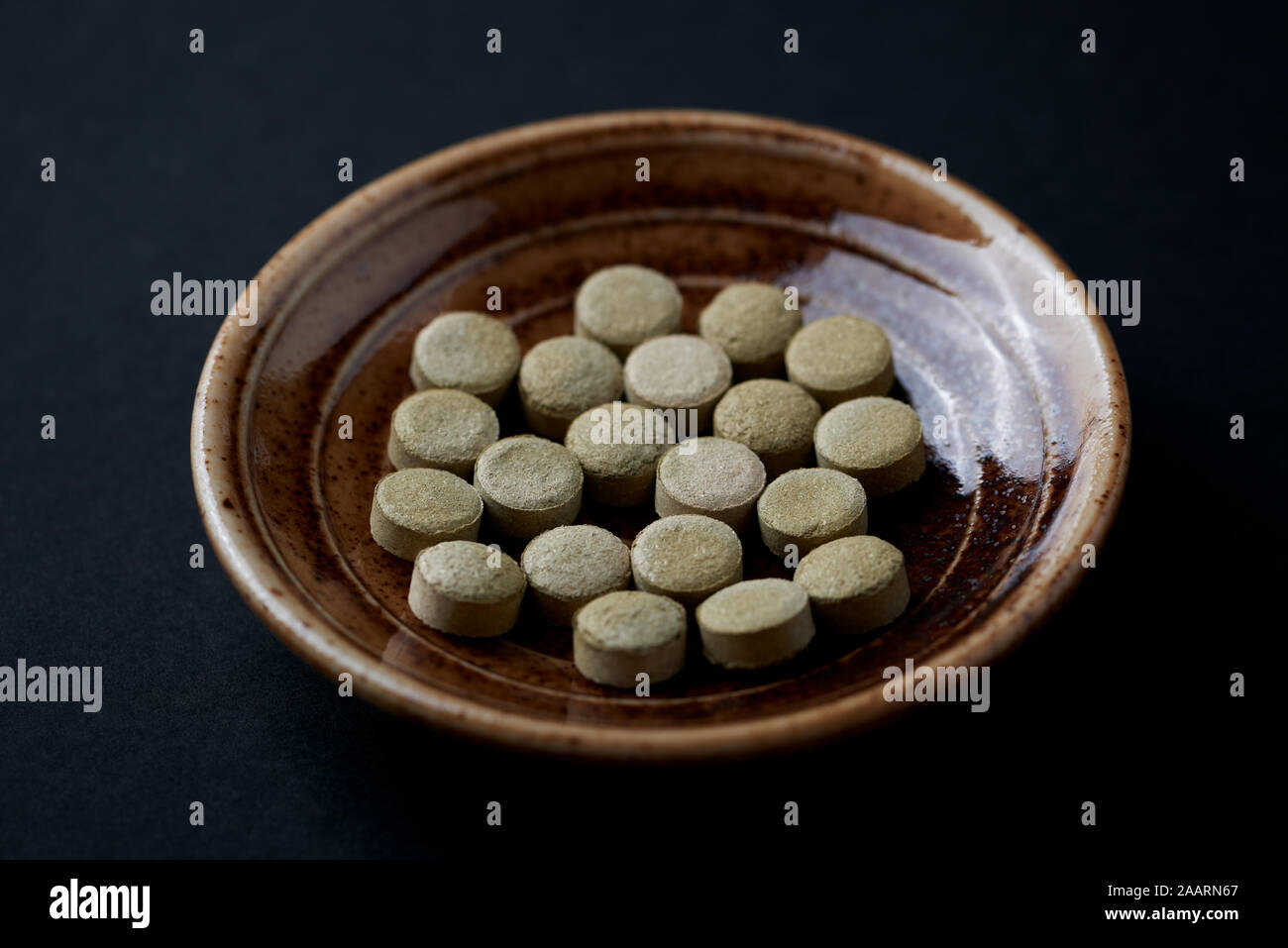 Bio Green BARLEY GRASS tablets. Concept for a healthy dietary ...