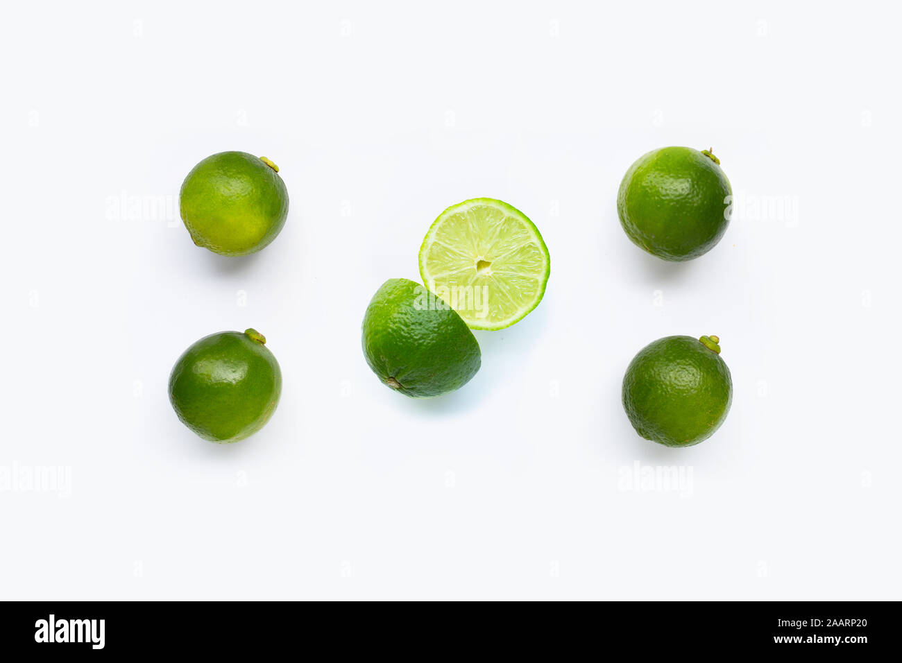 Fresh limes on white background. Copy space Stock Photo - Alamy