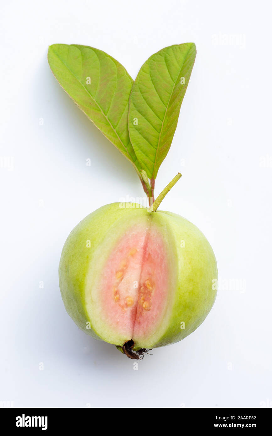 Fresh ripe guava with leaves on white background Stock Photo - Alamy