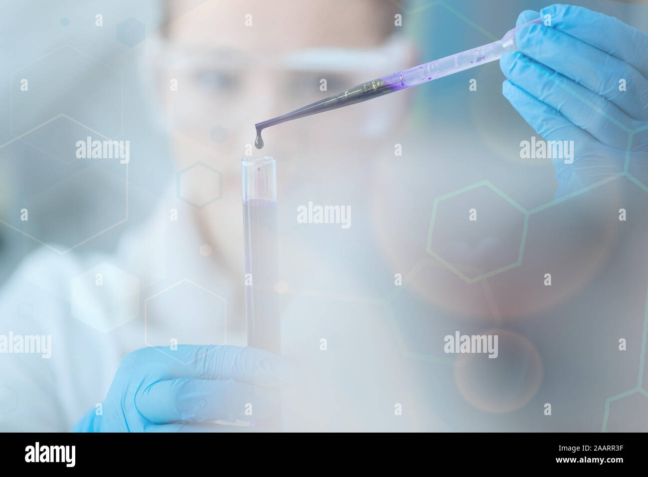 Young Female Laboratory scientist working at lab with test tubes, test ...