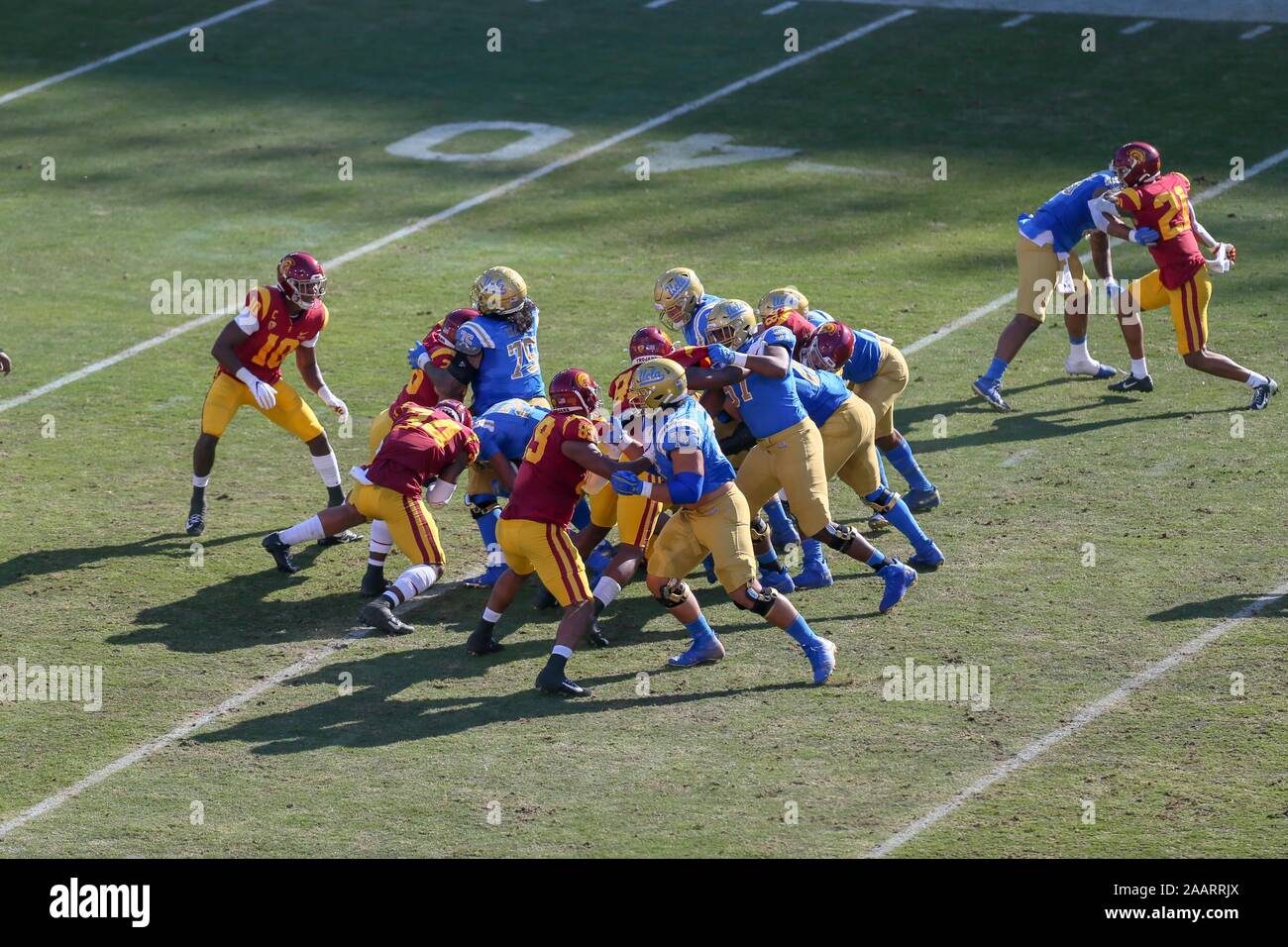 Teams linemen battling during the UCLA Bruins vs USC Trojans football ...