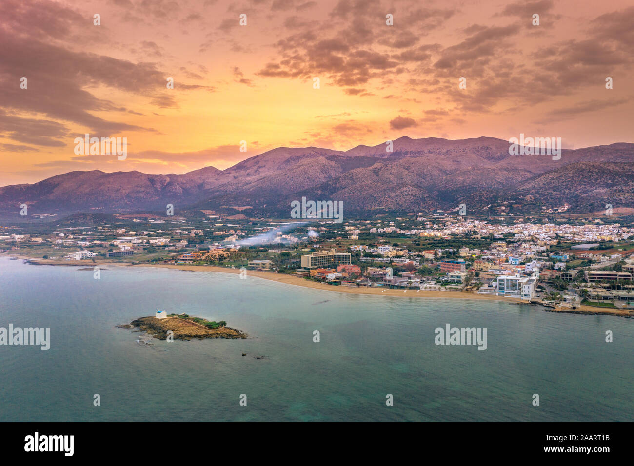 An old white church in a small island at sunset in Malia, Crete, Greece ...