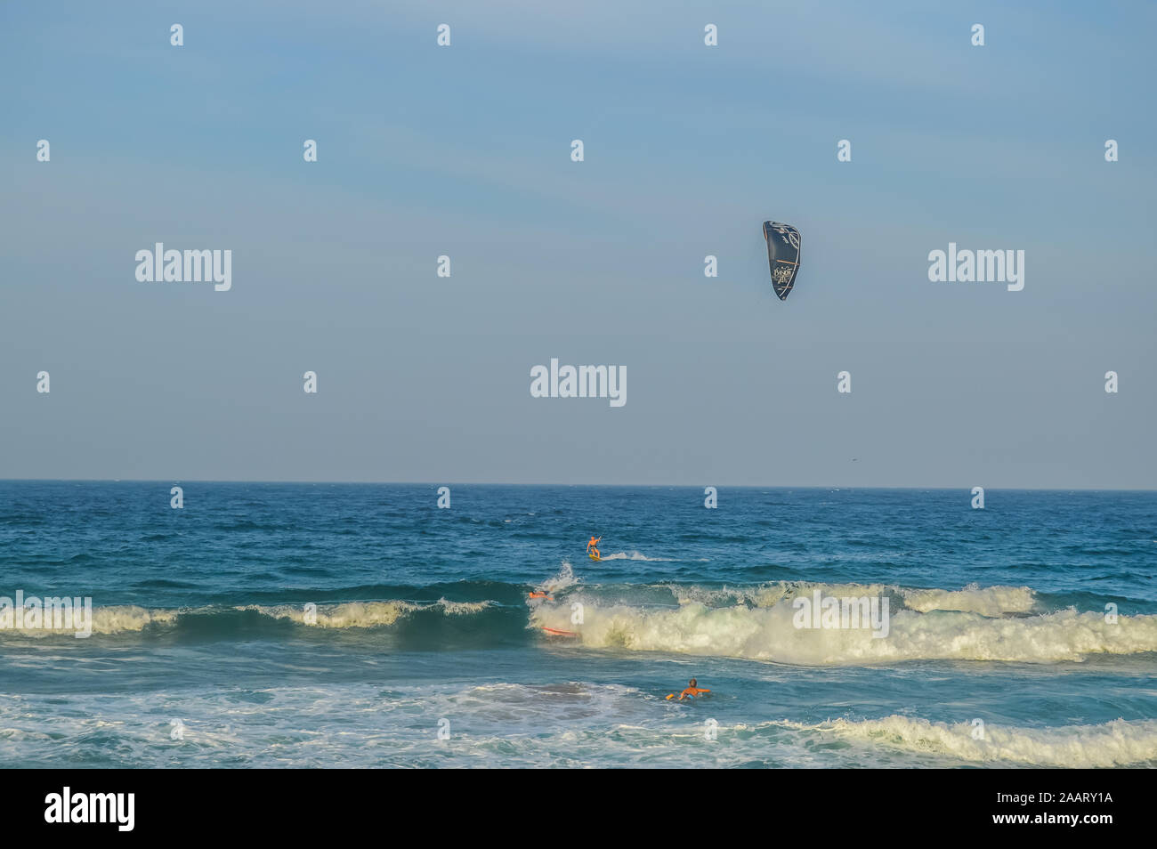Kite or parchute surfer doing adrenalin rush in Salt rock main beach in ...