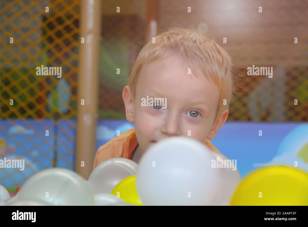 Little boy three years old enjoy playing in the playground Stock Photo ...