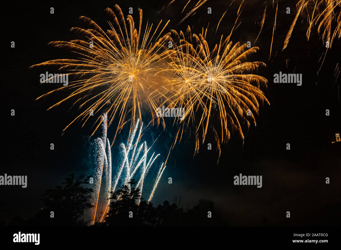 Beautiful fireworks exploding over dark hi-res stock photography and ...