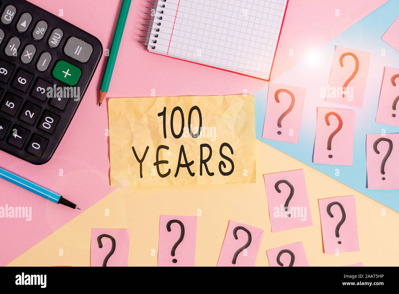 Writing note showing 100 Years. Business concept for Remembering ...