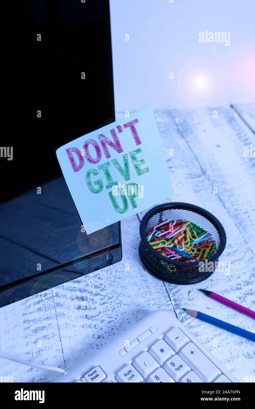 Writing note showing Don T Give Up. Business concept for Determined ...
