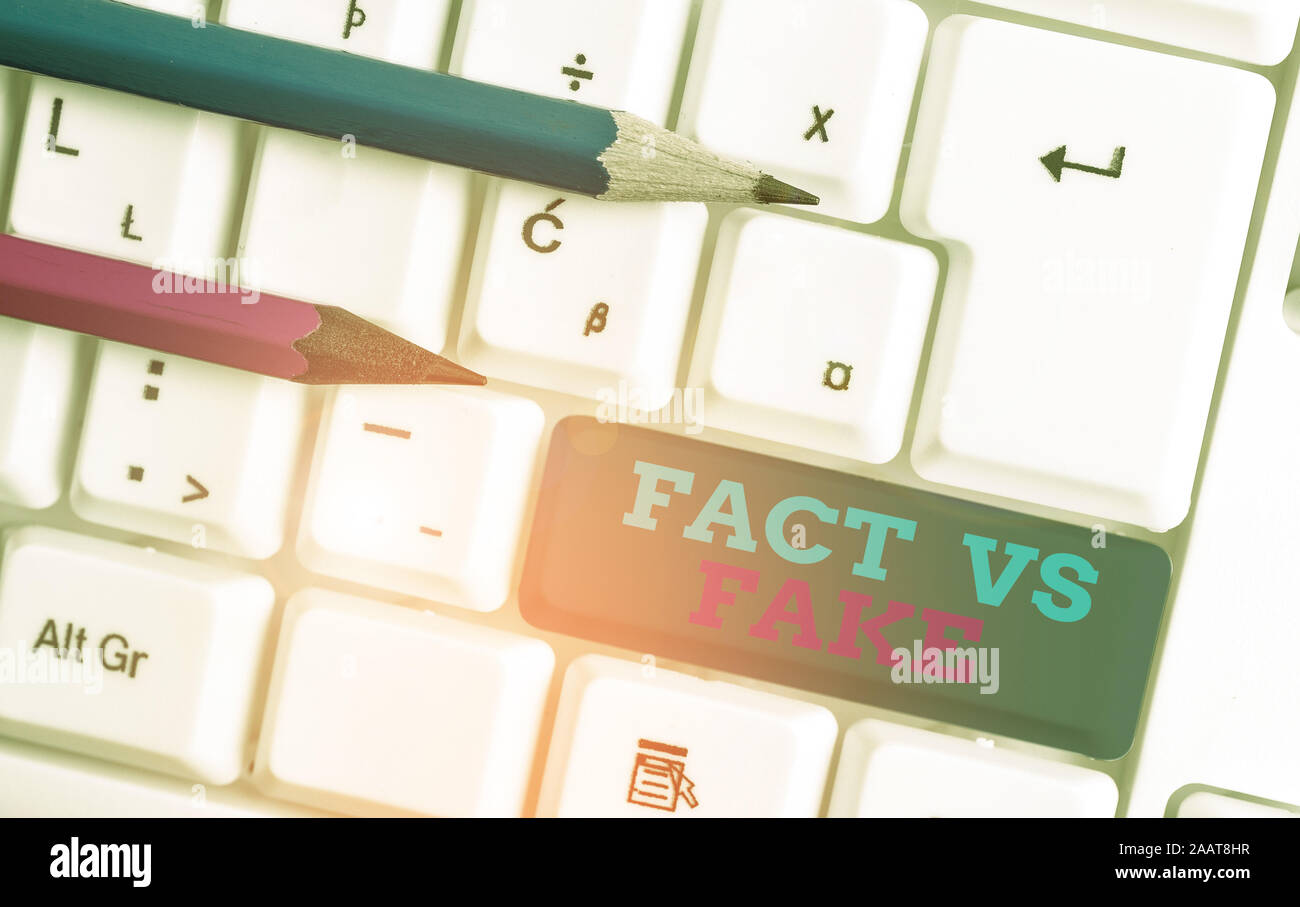 Conceptual hand writing showing Fact Vs Fake. Concept meaning Rivalry ...