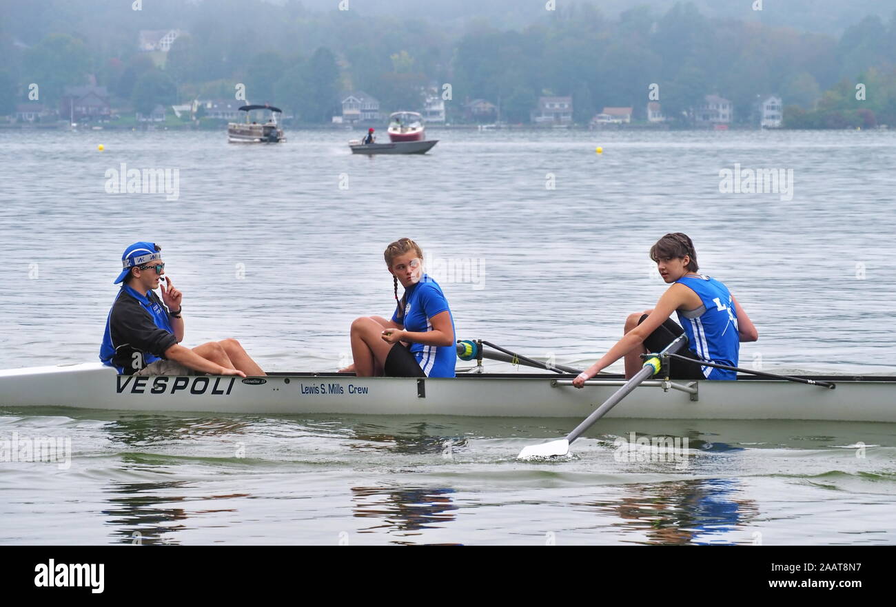 East Hampton, CT USA. Sep 2017. Rowing crew cruising out to the regatta ...