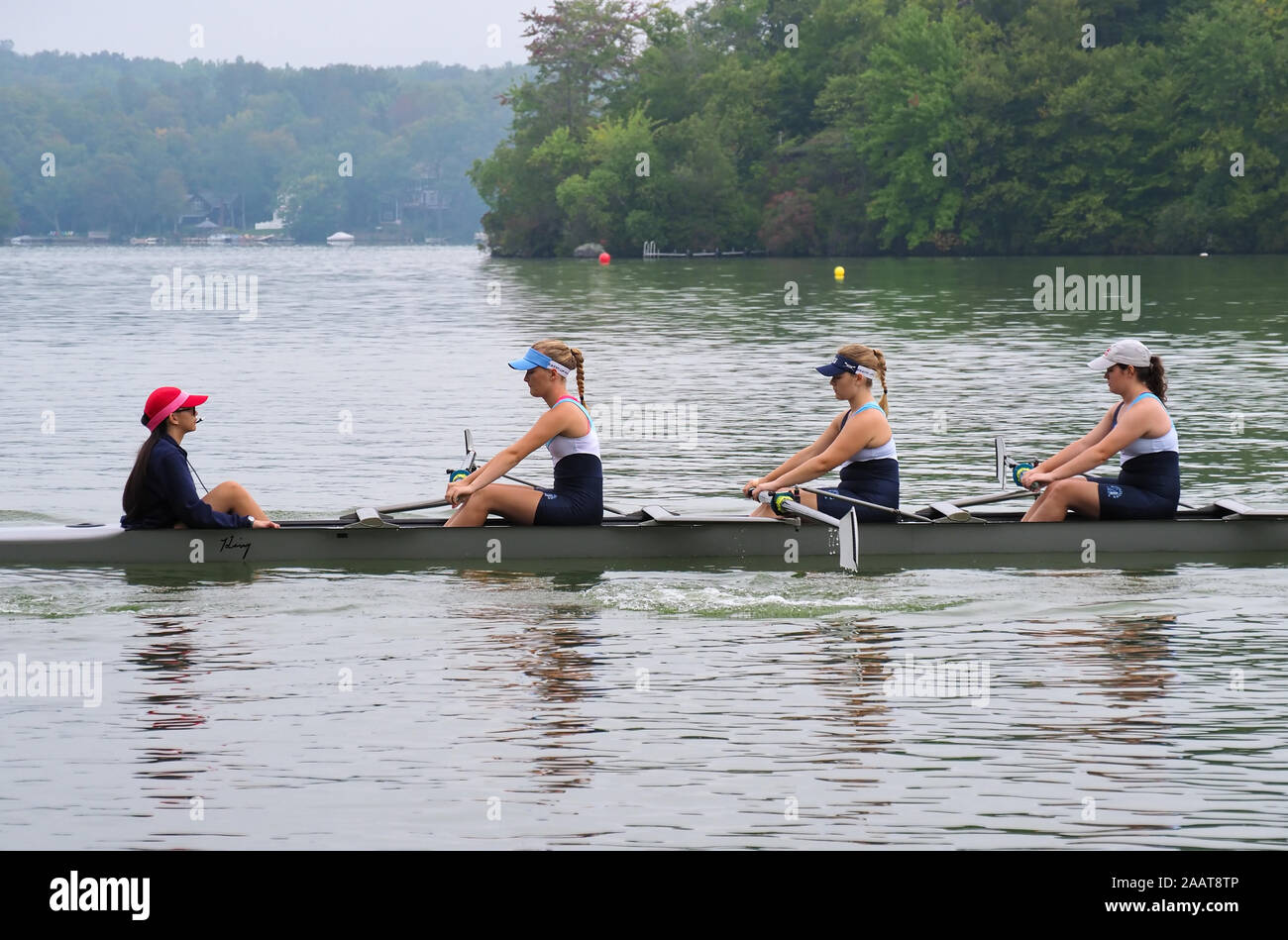 East Hampton, CT USA. Sep 2017. Rowing crew cruising out to the regatta ...