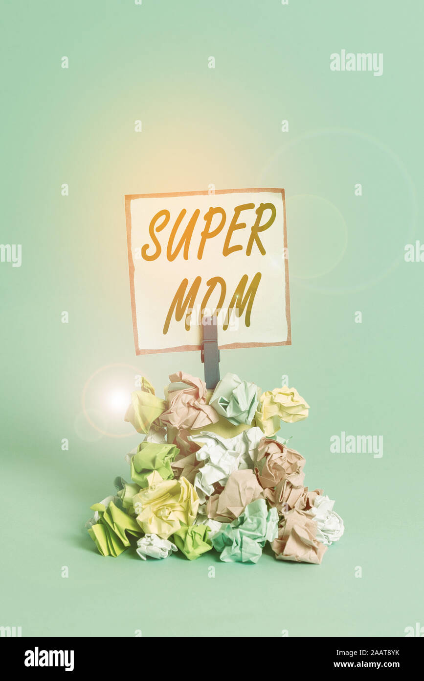 Handwriting text Super Mom. Conceptual photo a mother who can combine ...