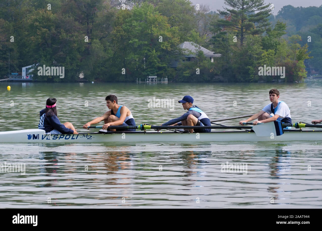 East Hampton, CT USA. Sep 2017. Rowing crew cruising out to the regatta ...