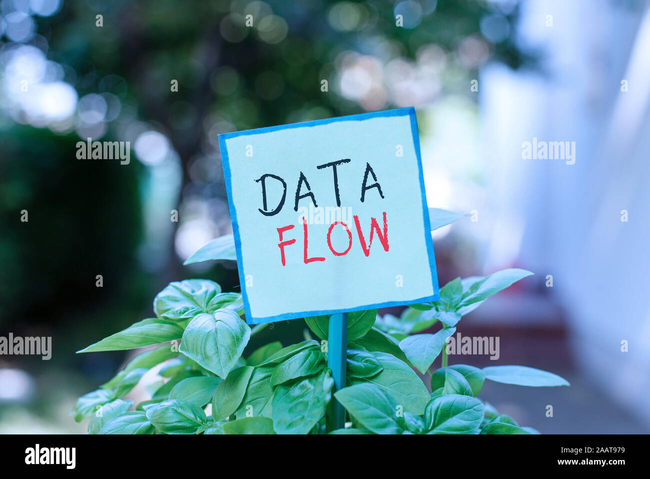 Conceptual hand writing showing Data Flow. Concept meaning the movement of data through a system ...