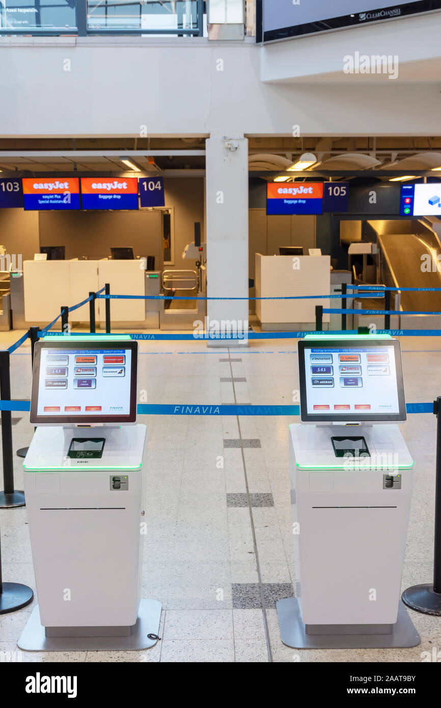 Check in machines hi-res stock photography and images - Alamy