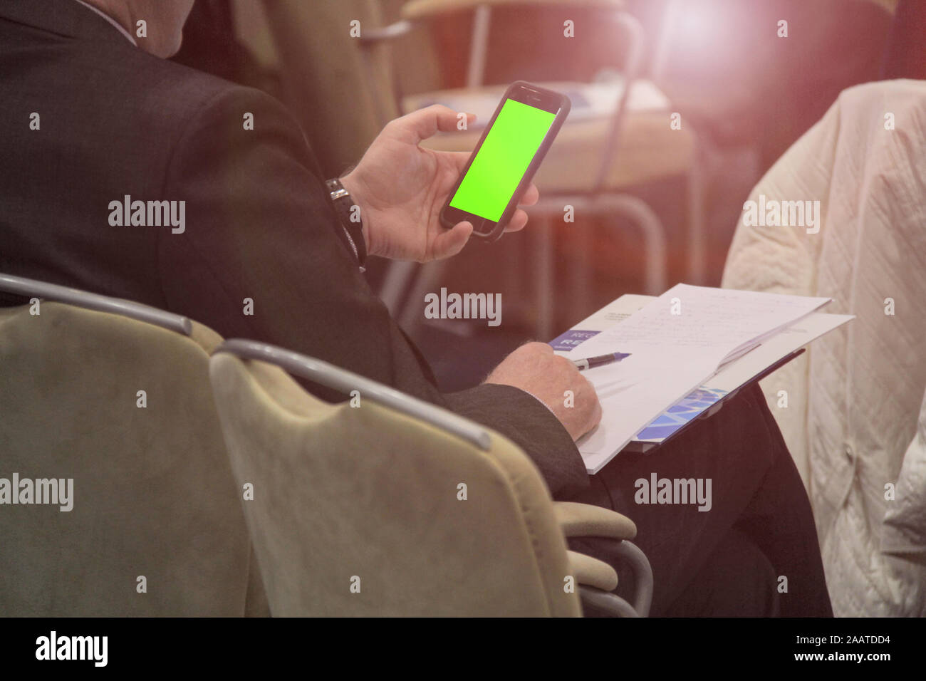 Businesspeople during video conference sitting in conference room or ...
