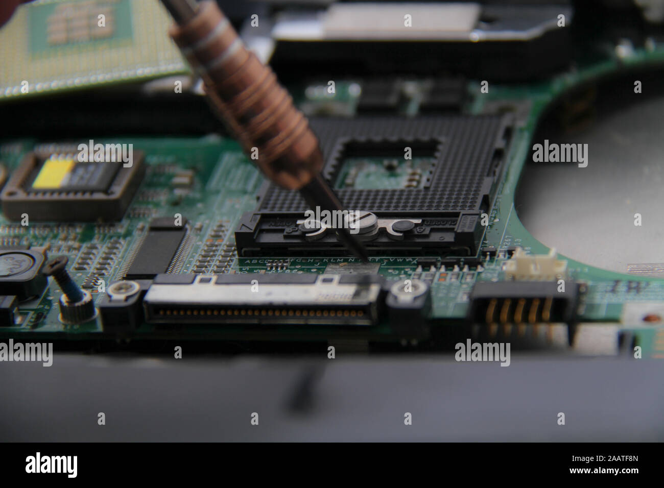 Computer repair concept Close-up view. Computer service. Man repairing ...