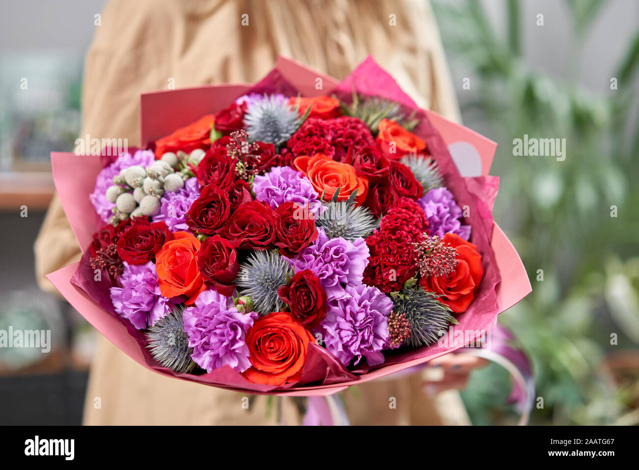 Modern floral shop. Finished work of the florist. Cute bouquet of mixed ...