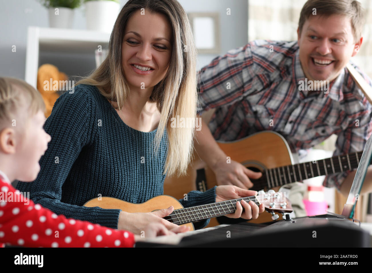 Family musical instruments hi-res stock photography and images - Alamy
