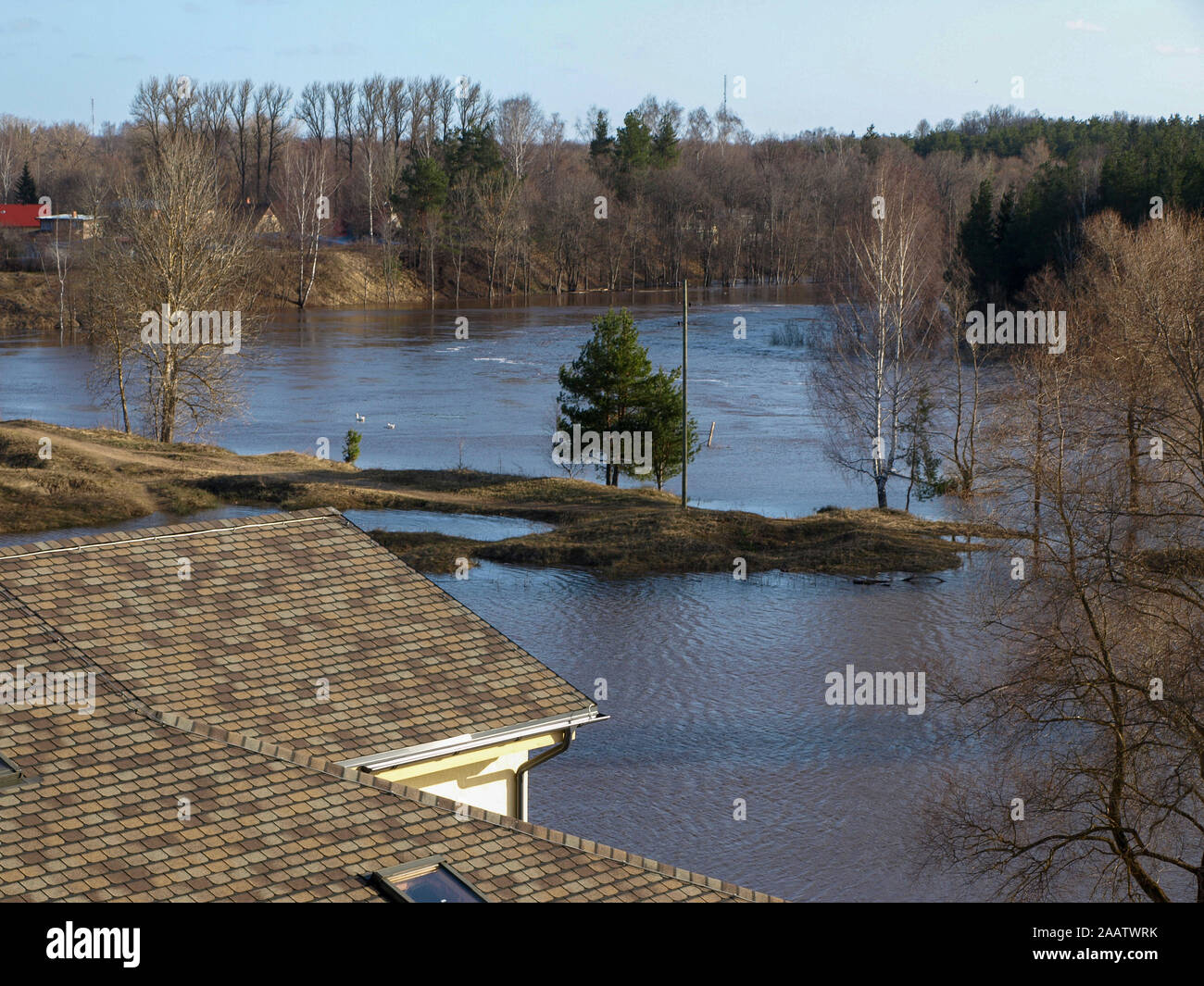 misty spring landscape with flooded river, view from above over the ...