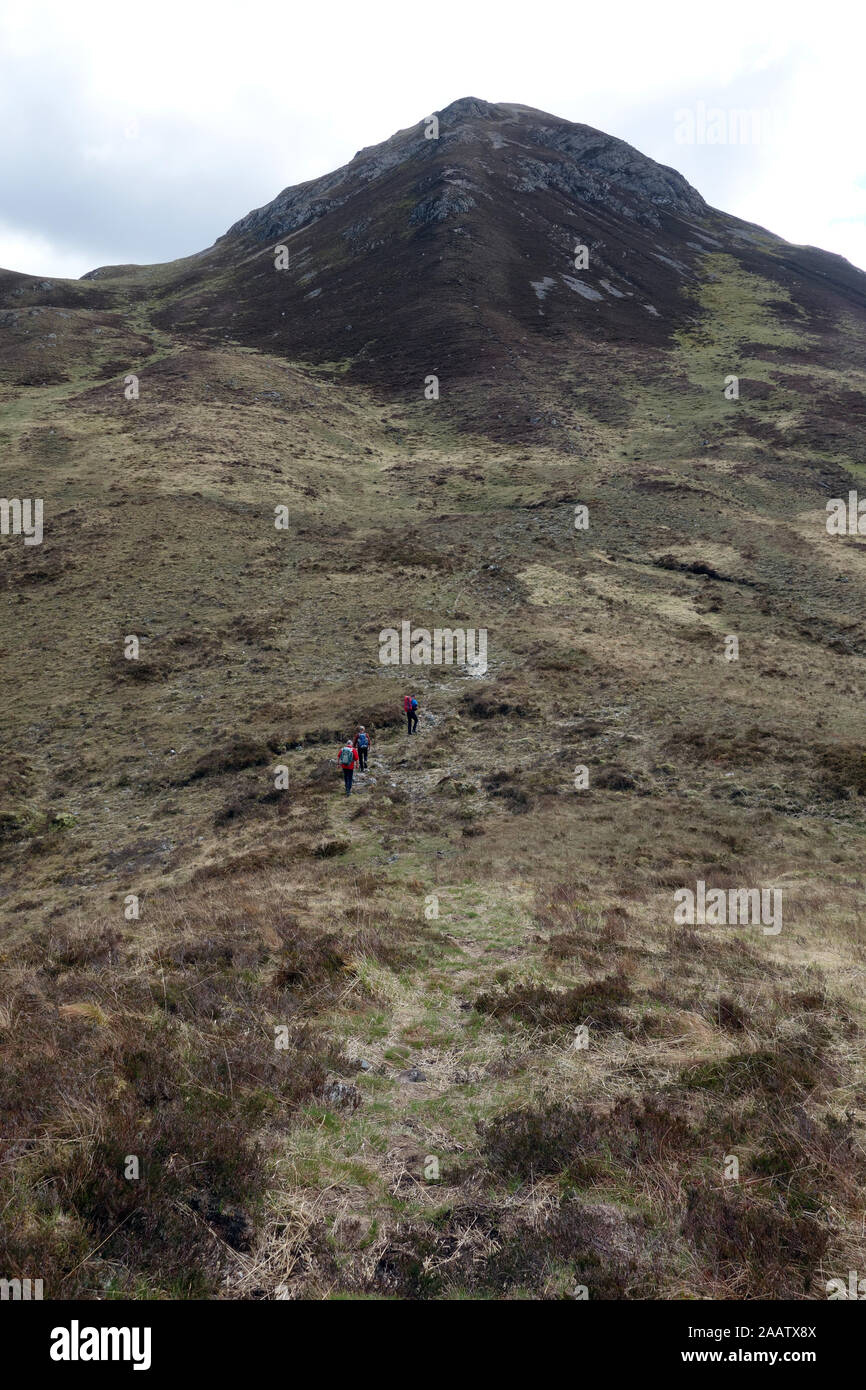 Three Men Walking on Stob Coire Sgoilte to the Scottish Mountain ...