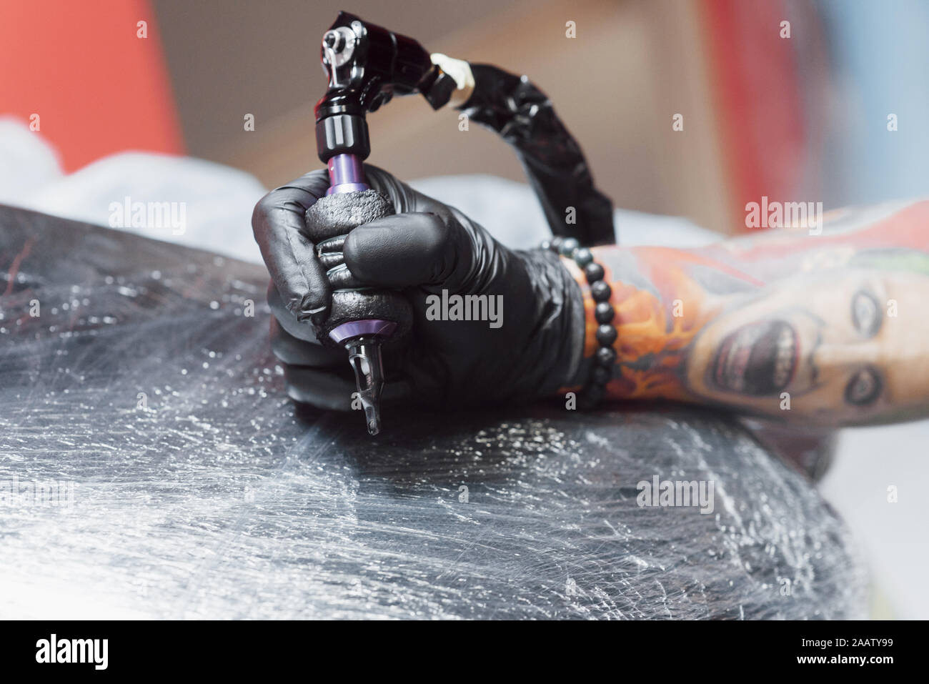 Studio artist work tattooing machine hi-res stock photography and ...