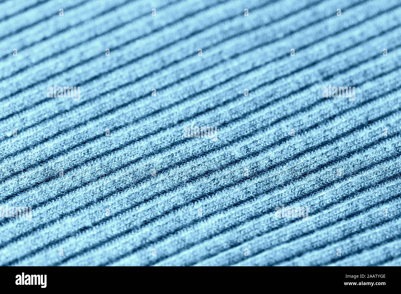 Knitwear texture close-up. Textile background blue color toned Stock Photo - Alamy