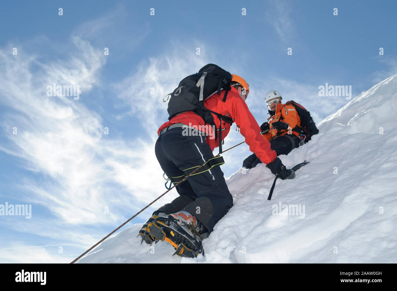 Alpinist woman rope hi-res stock photography and images - Alamy